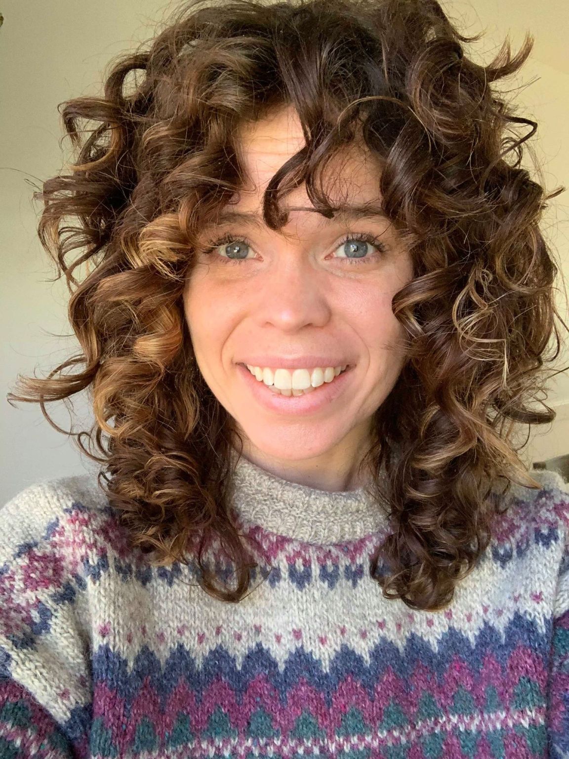5 Things To Consider Before You Get Curly Bangs